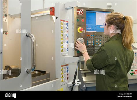 Female Apprentice Works CNC Machine Stock Photo Alamy