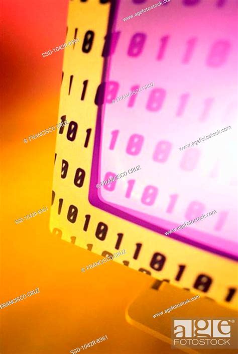 Binary Code Superimposed Over A Computer Monitor Stock Photo Picture And Royalty Free Image