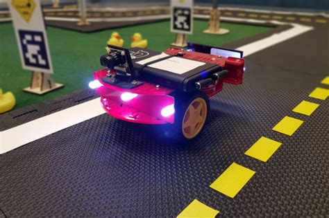 Integrated Benchmarking And Design For Reproducible And Accessible Evaluation Of Robotic Agents