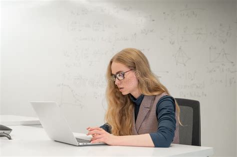 Caucasian Woman Scientist Typing On Laptop White Board With Formulas Stock Image Image Of