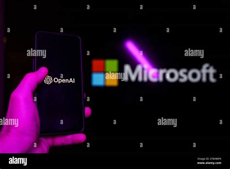 OpenAI Logo And Microsoft Logo In Background Displayed On The Screens Stock Photo Alamy