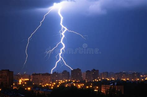 Lightning Strikes Over City Skyline During Nighttime Thunderstorm Stock Image Image Of