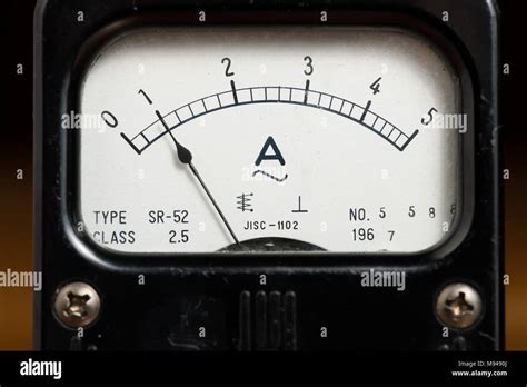 Details Of An Old Black Analog Ampere Meter Scale And Indicator Stock