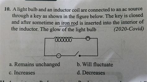 A Light Bulb And An Inductor Coil Are Connected To An Ac Source Through A