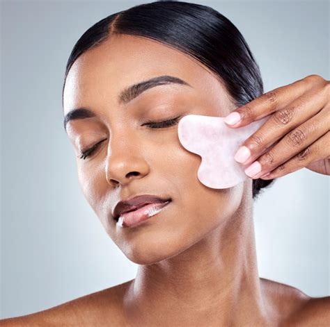 Premium Photo Massage Skincare And Gua Sha With Face Of Woman In