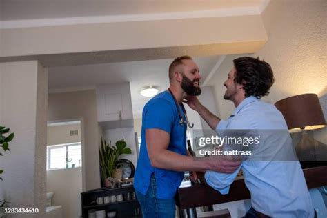 Gay Couple Doctor Photos And Premium High Res Pictures Getty Images