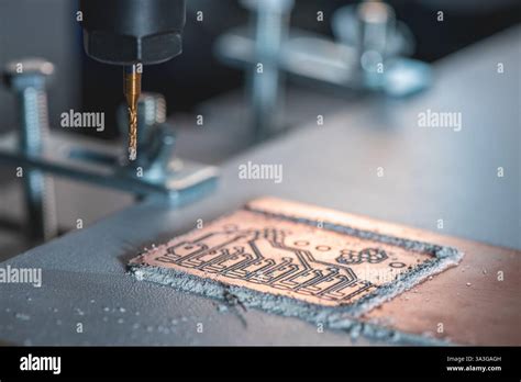 Machine With Numerical Control Cnc Carries Out Milling Of Printed Circuit Boards Circuit