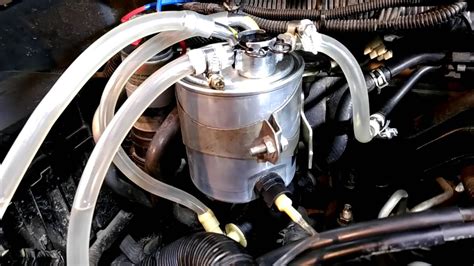 Где находится обратный клапан топливной системы ниссан навара 84 фото