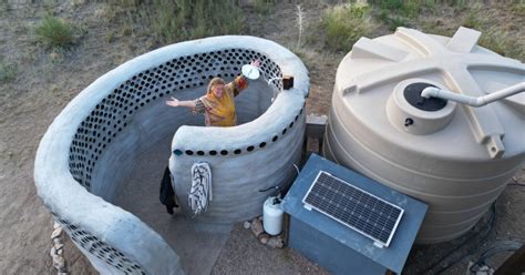 Off Grid Outdoor Shower Built With Hyperadobe Bags And Glass Bottle