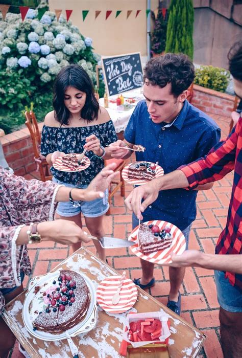 Friends Eating Cake And Having Fun In Party Stock Image Image Of