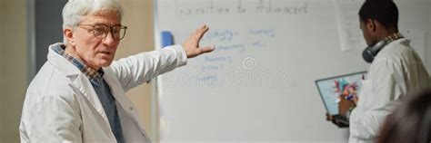 Senior Professor Teaching Medicine In Class Header Image Stock Image Image Of Adult Footer