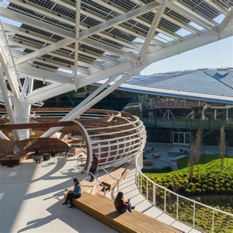 Trellis With Photovoltaic Panels Covers Outdoor Workspace In California