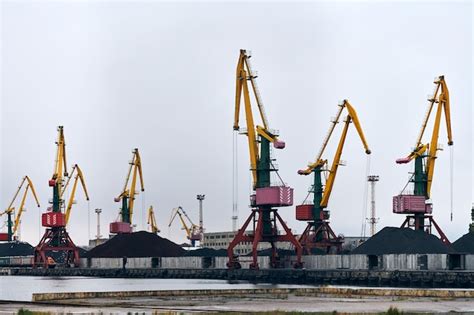 Premium Photo Massive Harbor Cranes In Seaport Heavy Load Dockside Cranes In Port Cargo