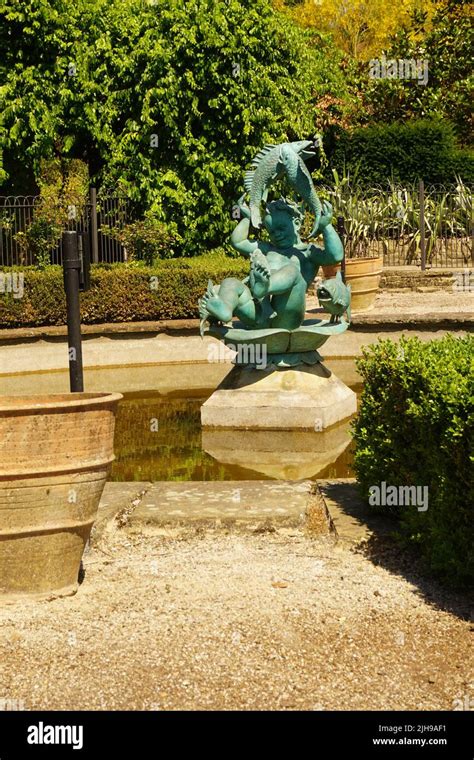 Ornamental Pond With Statue At Golders Hill Park London United