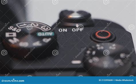 Close Up Of DSLR Camera Buttons And Dials Action Details Of A New Professional Camera On White