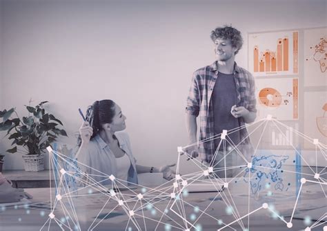 Premium Photo Network Of Connections Against Male And Female Colleagues Working At Office