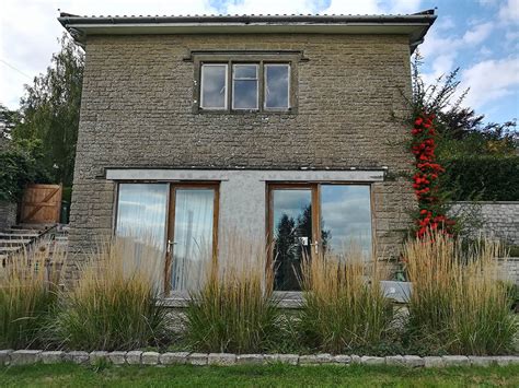Hillside Garage Conversion With Brimstone Sycamore Cladding Vastern