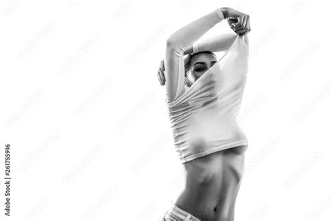 Portrait Of Beautiful Brunette Young Woman In White T Shirt Standing