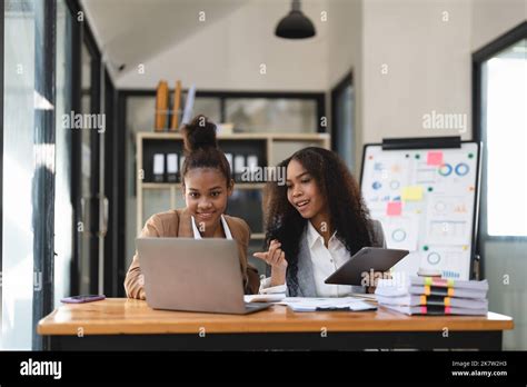 Diverse Coworkers Working Together In Boardroom Brainstorming