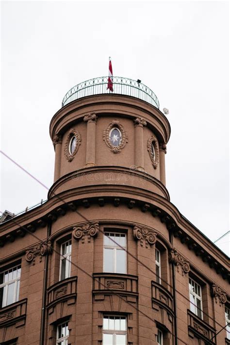 An Elegant Historic Building With Classical Architecture Featuring Decorative Columns Arched