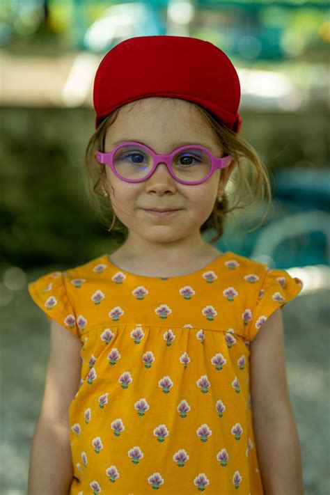A Girl Wearing Pink Glasses Photo Free Acheron Image On Unsplash