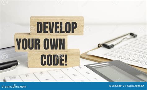 Develop Your Own Code Symbol Concept Words Develop Your Own Code On Wooden Blocks Stock Image