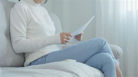 Modern Woman Use Phone To Scan Barcode Or QR Codes To Pay Credit Card Bill After Receiving
