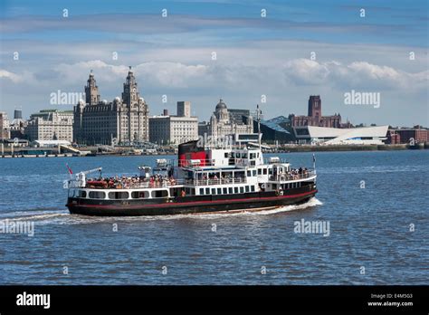 Mersey Ferry Crossing The River Mersey In Front Of The Liver Building