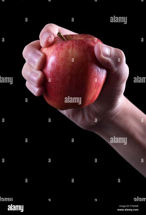 Hand squeezing fruit hi-res stock photography and images - Alamy