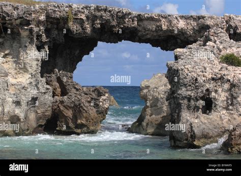Hells Gate Island Eroded Sea Arch And Shallow Sea With Waves Stock