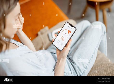 Woman Measure Heart Rate With Smart Technology Stock Photo Alamy