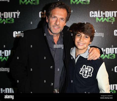 Stephane Freiss And His Son Pose During The Call Of Duty Modern