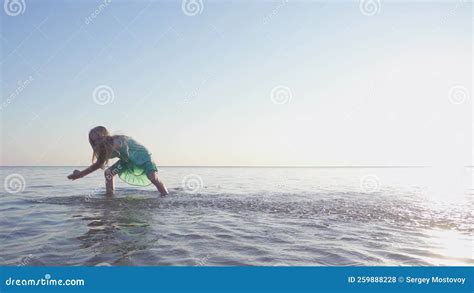 Young Girl Making Splashes Stock Footage Video Of Droplet 259888228