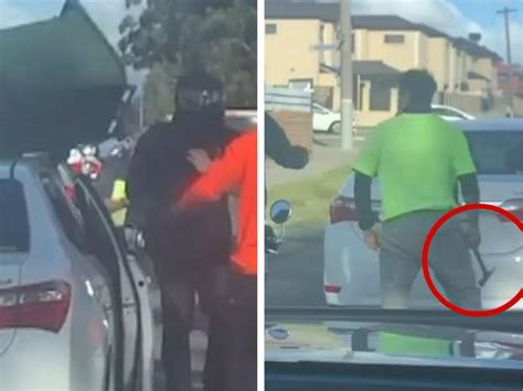 Motorbike Rider And Two Men In Car Use Hammers And Bin In Road Rage