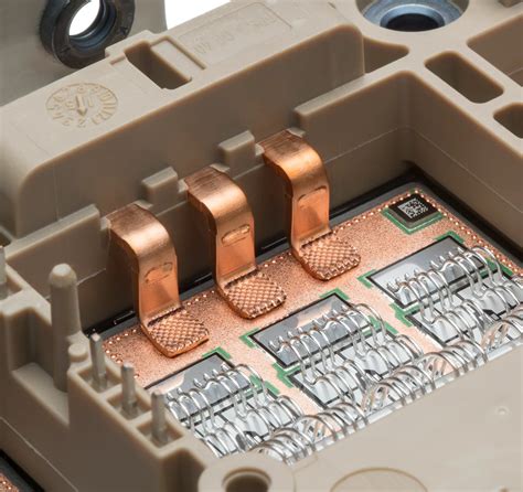 Pulse Inverter Module With Ultrasonically Welded Power Contacts