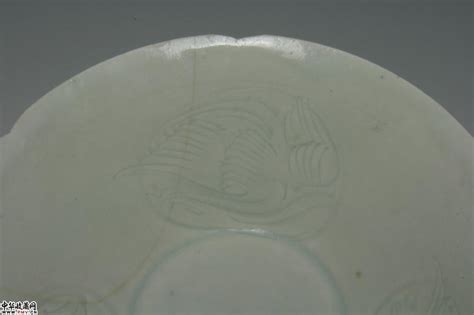 北宋湖田窑青白釉刻团凤纹葵口斗笠碗 藏家展厅 收藏资讯 艺术家 书画家 书画名人 书法家 中华收藏网