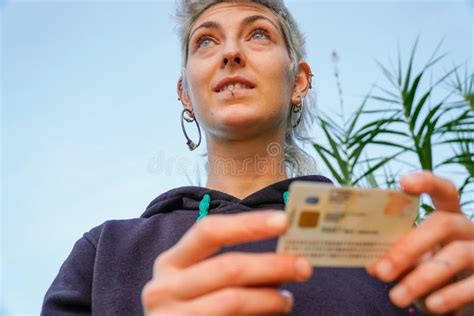 non binary person with their new name on the identity card gender