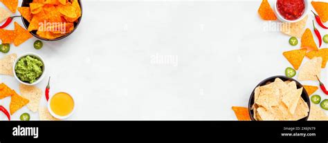 Nachos And Dip Double Border Top Down View On A White Marble Banner