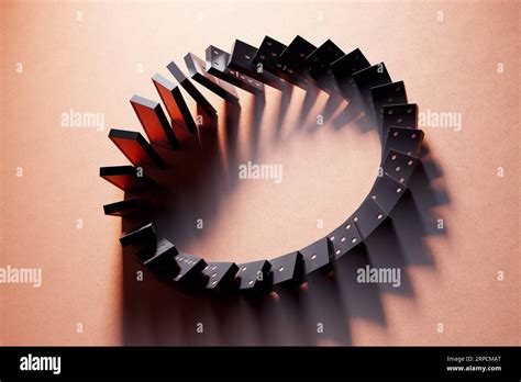 Domino Loop Falling In Moody Lighting Creates Intricate Shadows And