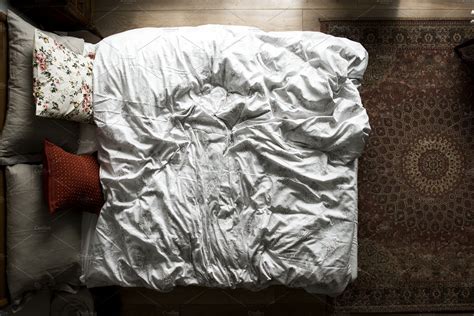 Top View Of An Empty Bed Featuring Aerial Bed And Bedroom People