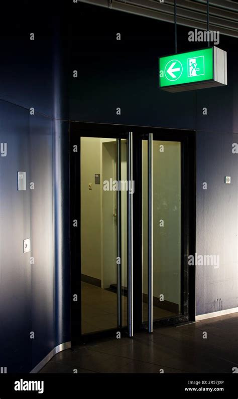 Emergency Exit Sign In Modern Offices Inside An Industrial Plant Stock Photo Alamy