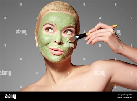 Beautiful Woman Applying Green Facial Mask Beauty Treatments Spa Girl Apply Clay Facial Mask