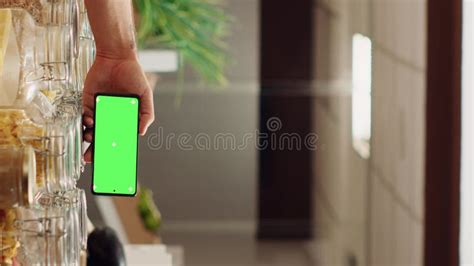 Vertical Video Man Uses Mockup Phone In Bio Supermarket Stock Footage Video Of Sustainable