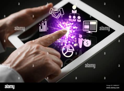 Marketing Man Using Tablet Against Black Background Closeup Virtual Icons Popping Out From