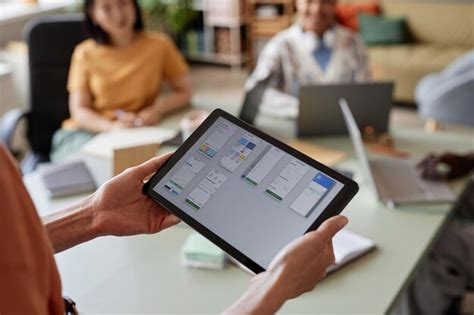 Premium Photo Close Up Of Young Businesswoman Holding Tablet With Ux