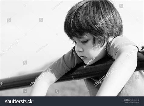 Sad Boy Standing Alone