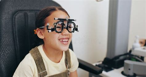 Trial Frame Smile Or Girl In Eye Test At Optometry Clinic For Eyewear