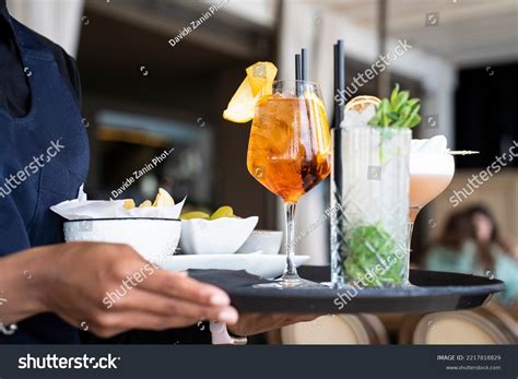 Black Waitress Serving Food