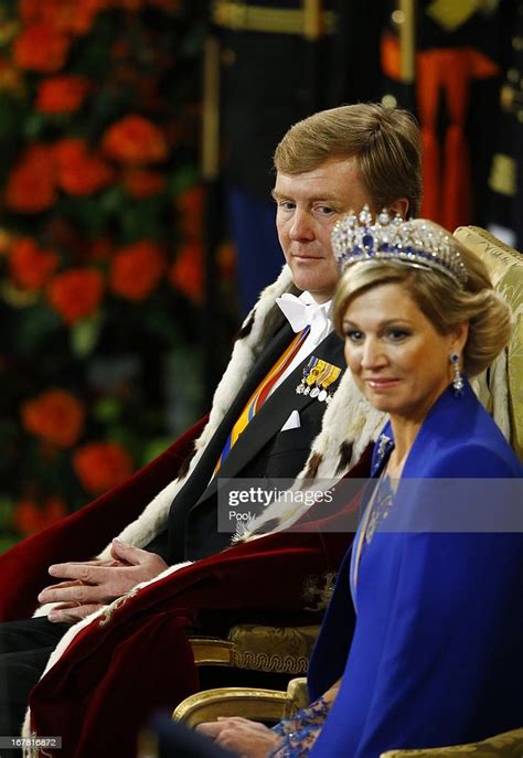 King Willem Alexander Of The Netherlands Sits Alongside Queen Maxima