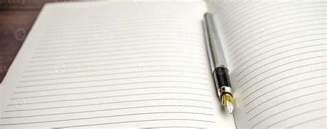 List Of Numbers On White Notepad With Pen On It Stock Photo At Vecteezy